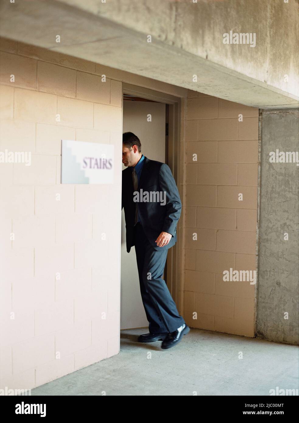 Businessman entering stairs Stock Photo - Alamy