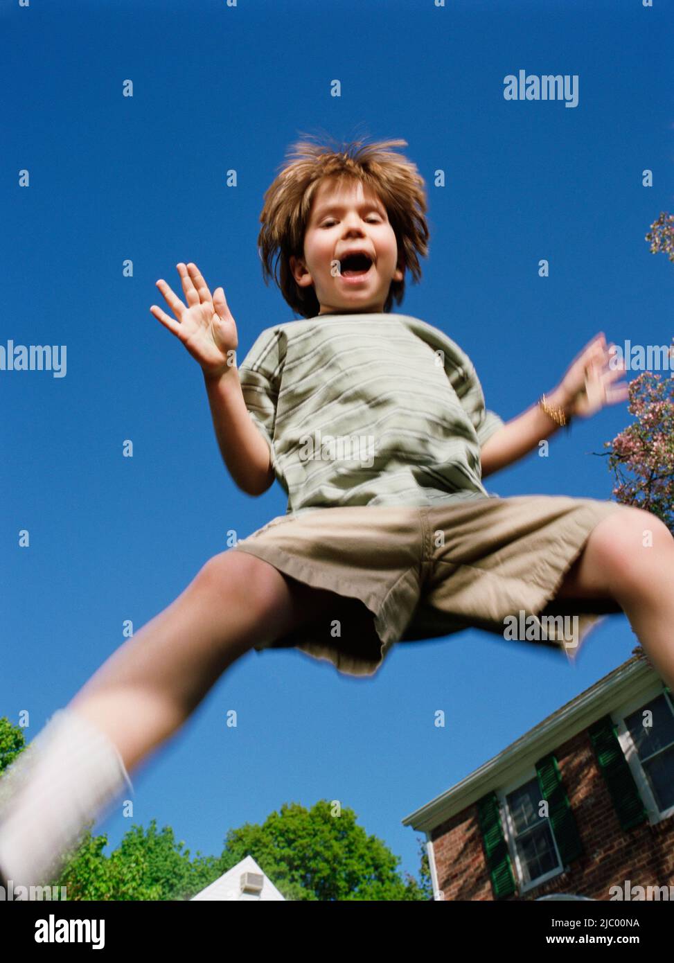 Summertime daytime outside outdoors youngster hi-res stock photography ...