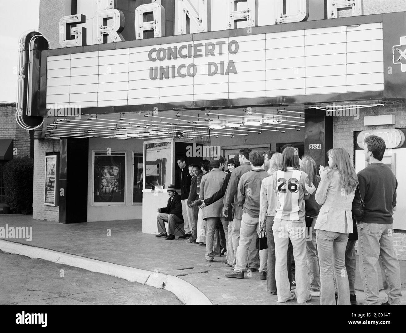 Line of people waiting at movie theater Stock Photo - Alamy