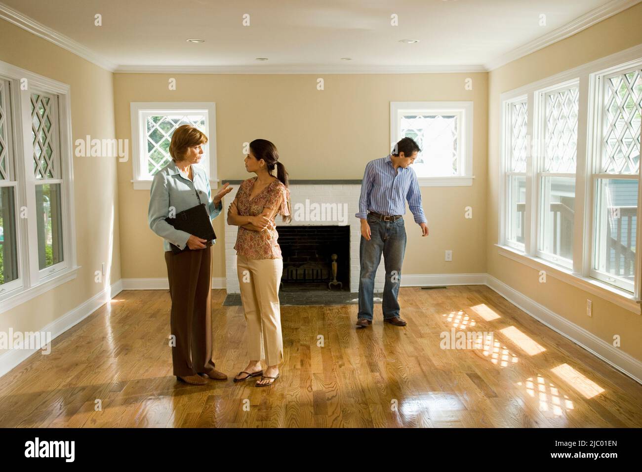 Latino couple talking house hi-res stock photography and images - Alamy