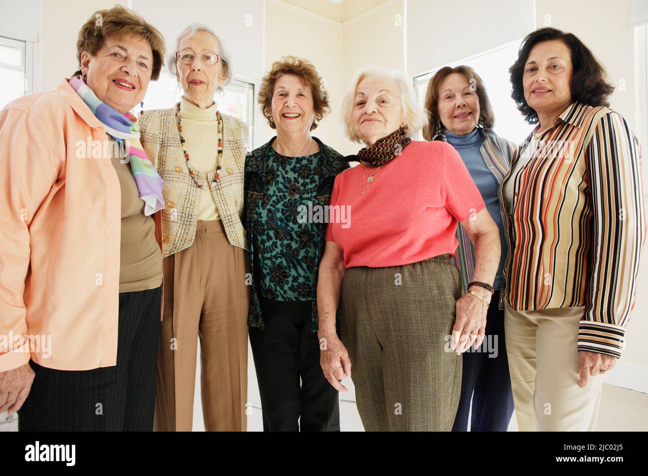 Group of elderly women smiling for the camera Stock Photo - Alamy