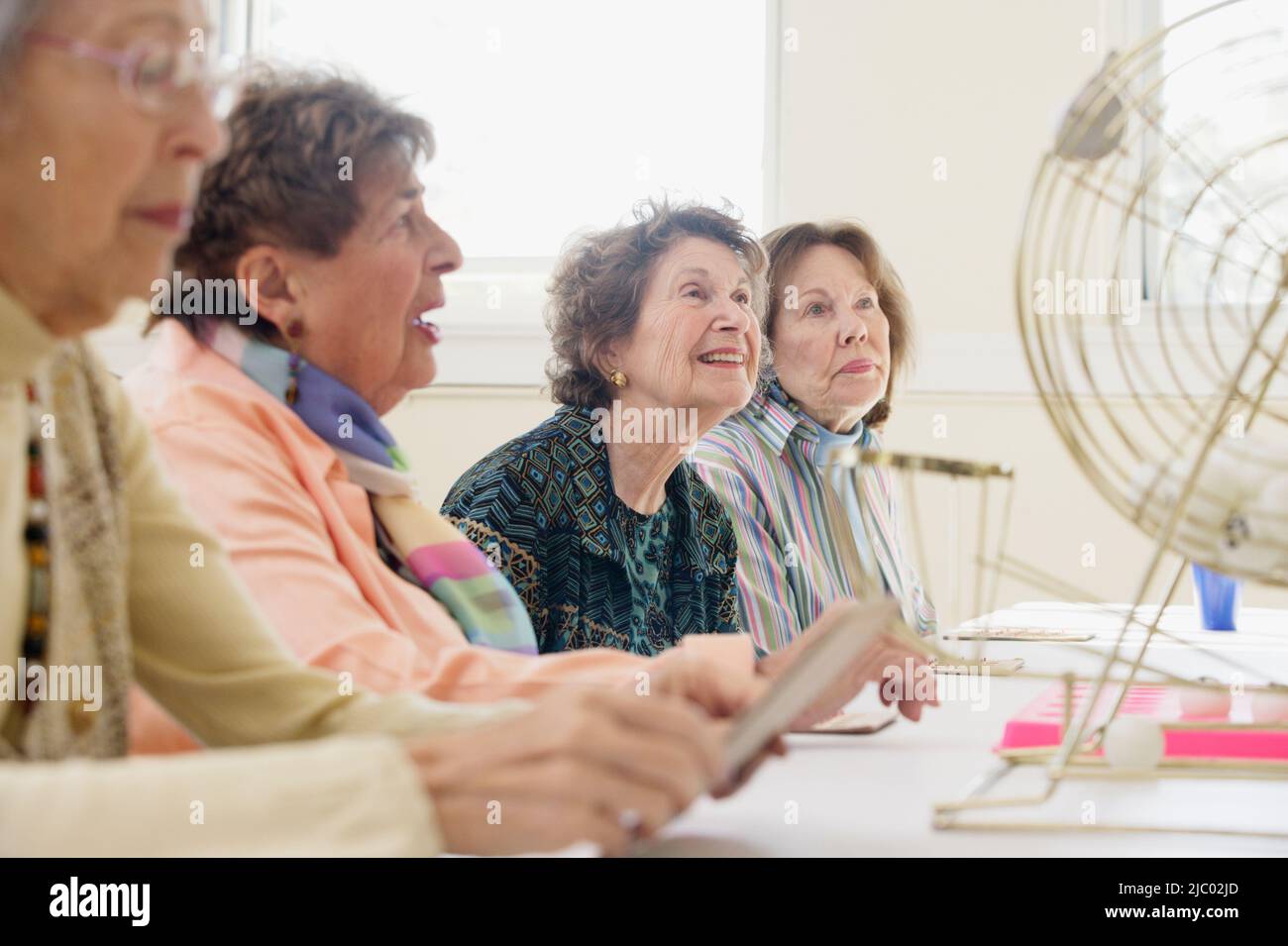 Elderly women playing bingo Stock Photo - Alamy