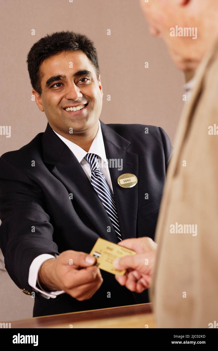 Indian businessman man credit card hi-res stock photography and images ...