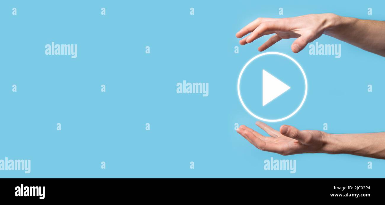 Businessman pressing, hold play button sign to start or initiate ...