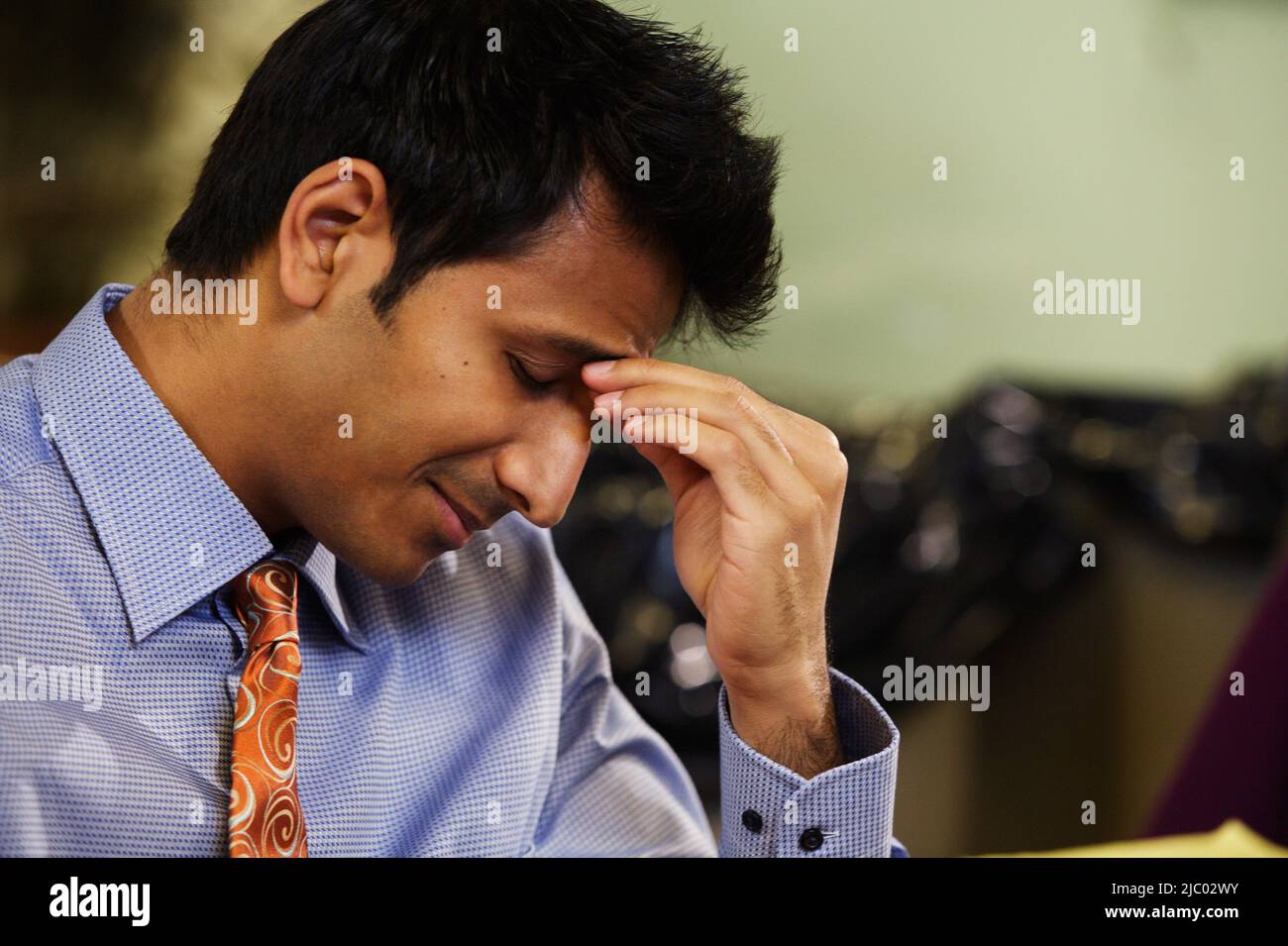 Frustrating man rubbing forehead hi-res stock photography and images ...