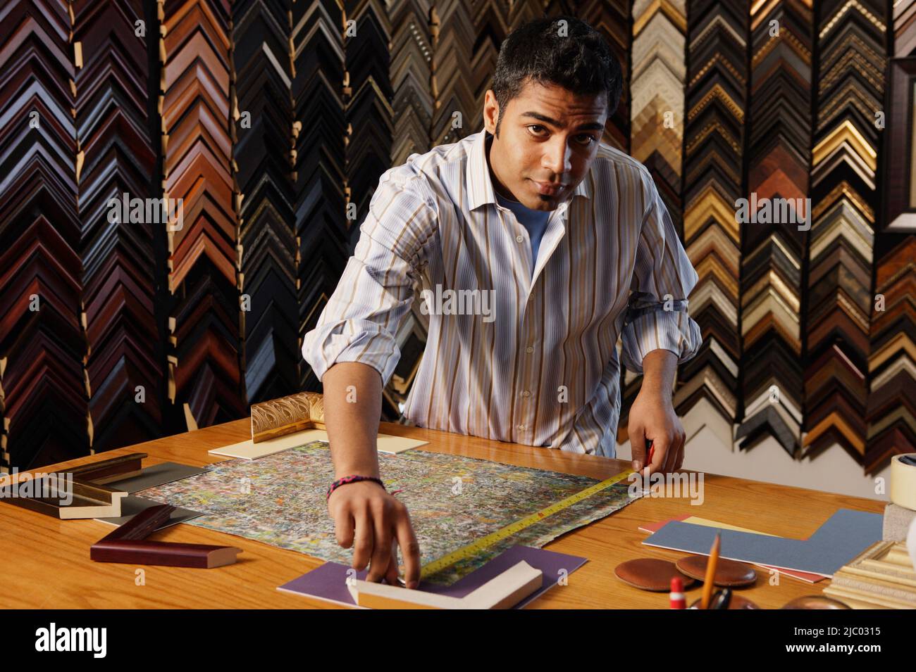 Young man framing a picture Stock Photo - Alamy