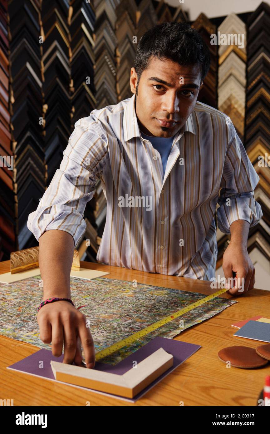 Young man framing a picture Stock Photo - Alamy