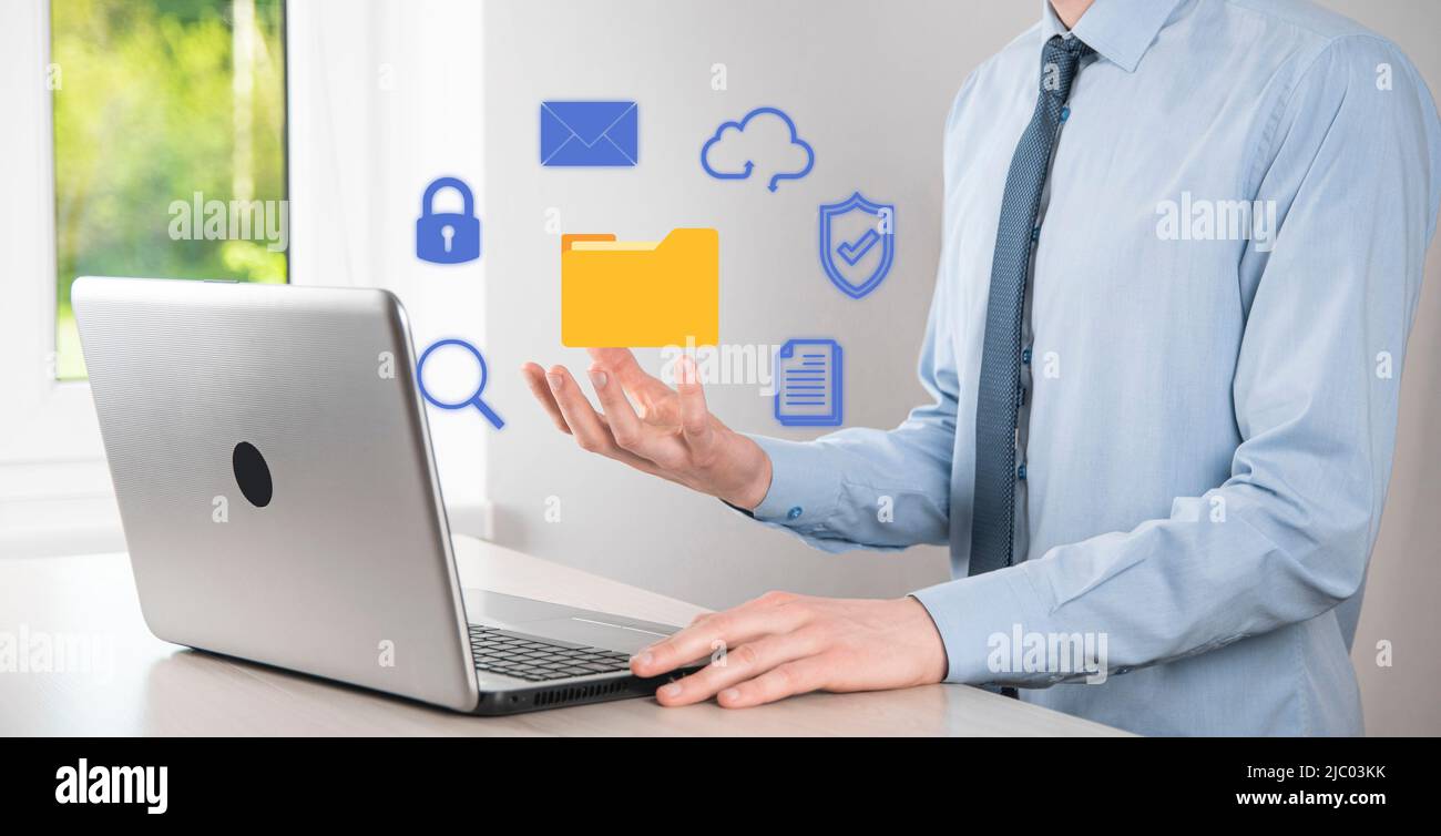 Document Management System DMS .Businessman hold folder and document ...