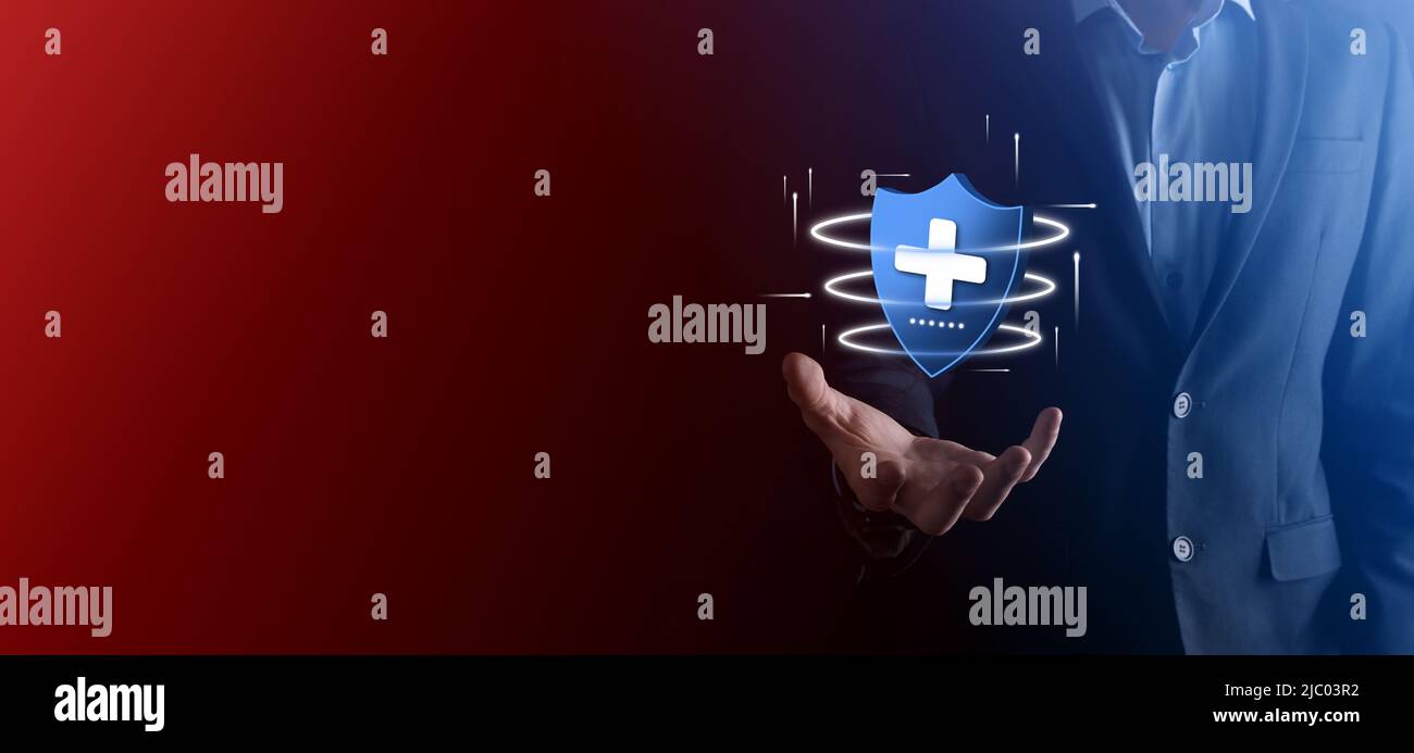 Businessman hold Shield with plus Low polygonal icon, medicine icon ...
