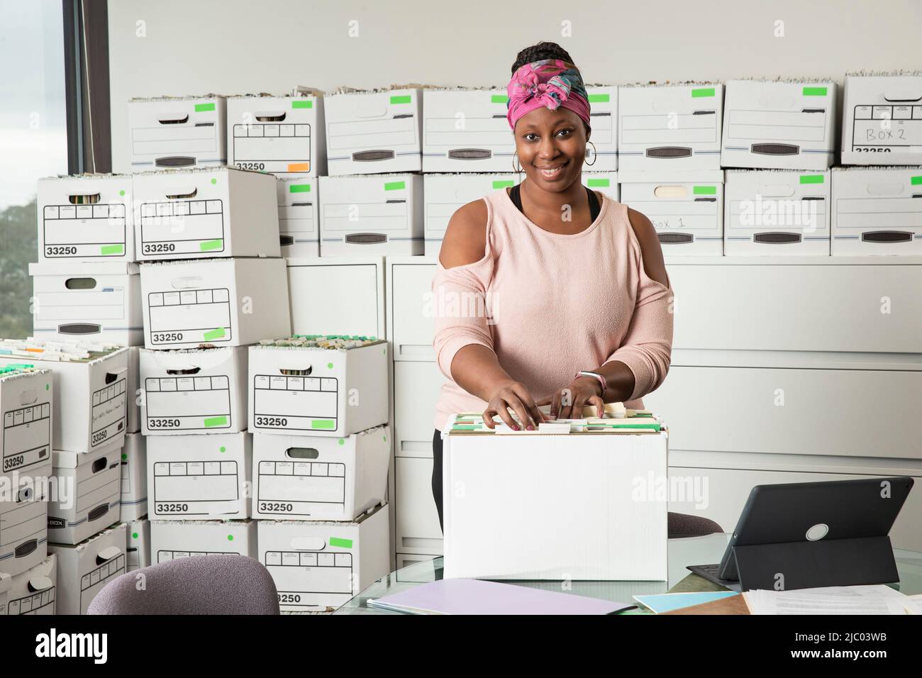 Black woman reading letter hi-res stock photography and images - Alamy