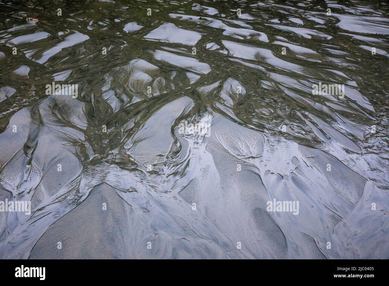 Beach sand drainage patterns hi-res stock photography and images - Alamy