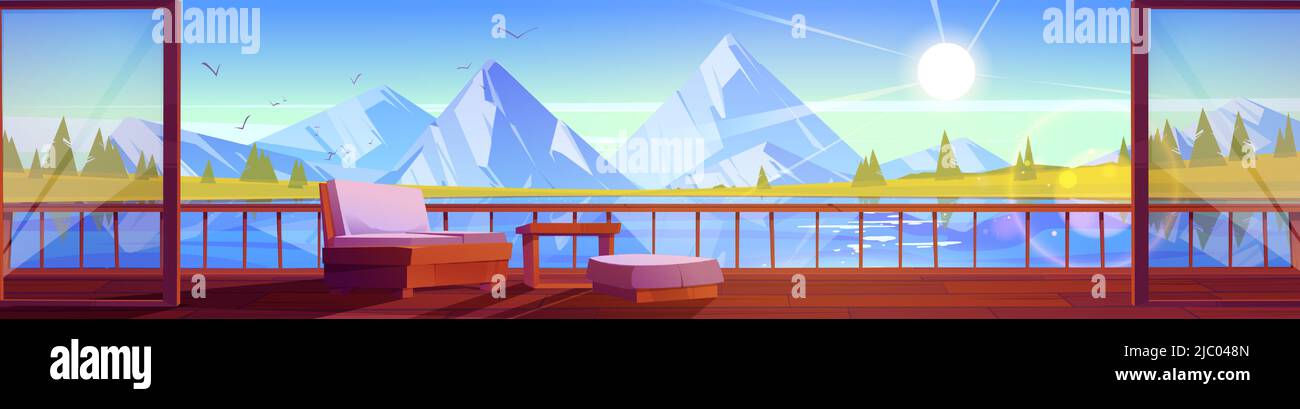 House terrace with couch and table on lake shore in mountain valley ...