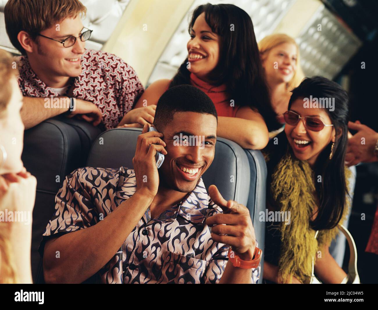 Young people relaxing together Stock Photo - Alamy