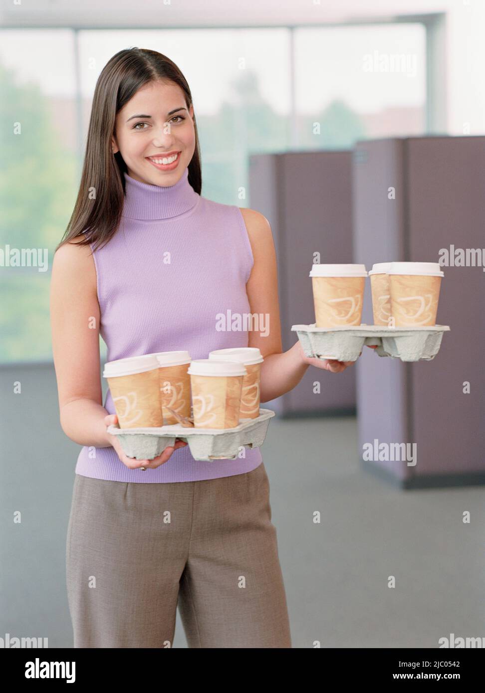 Women bringing food to office hi-res stock photography and images - Alamy