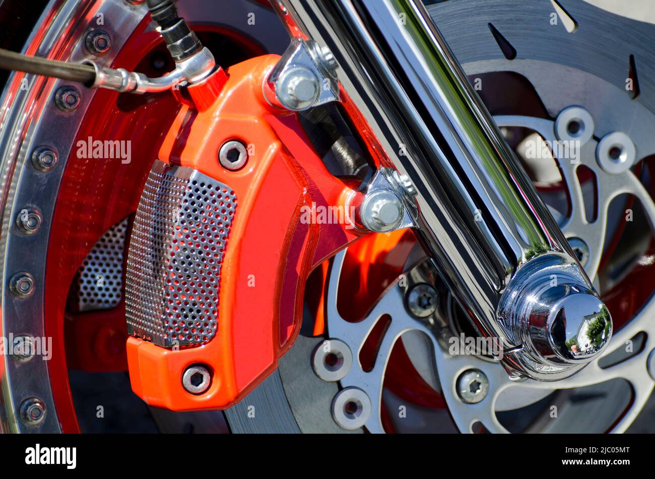 Modern Motorcycle Wheel Brake with Orange Color Stock Photo - Alamy