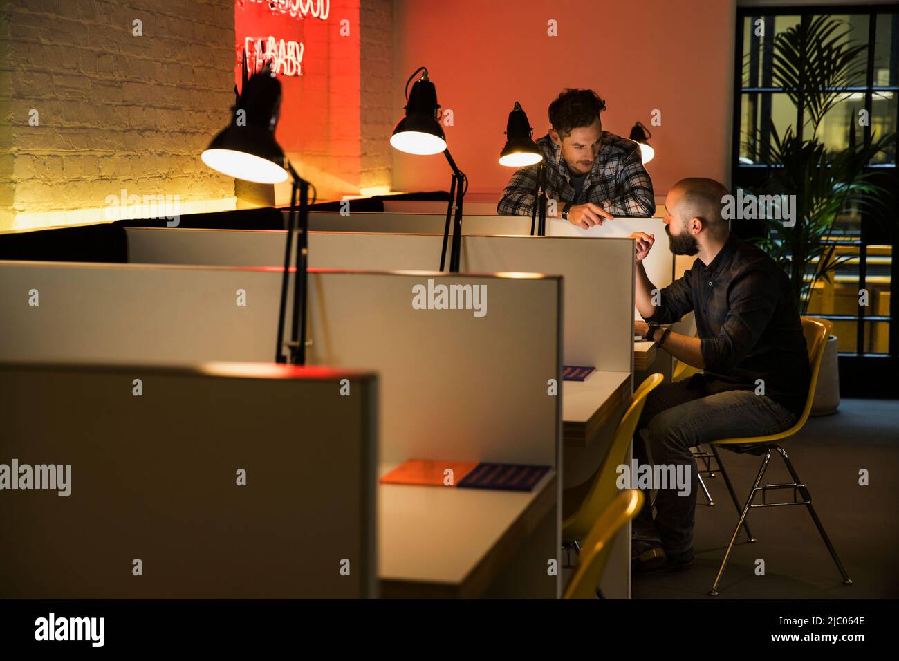 man working late in co-working space Stock Photo - Alamy