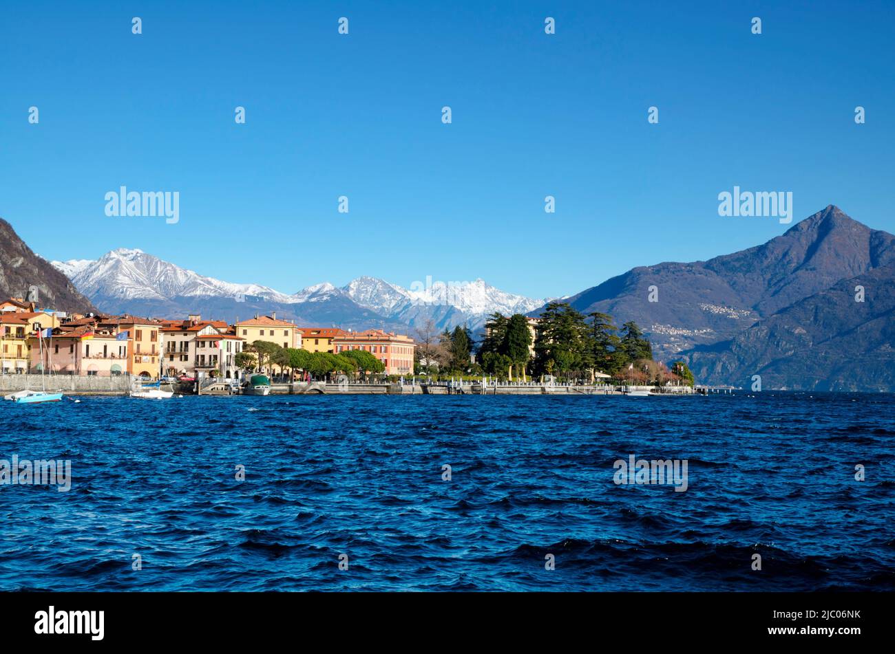 Village on the Waterfront with Snow-capped Mountain on Alpine Lake Como ...