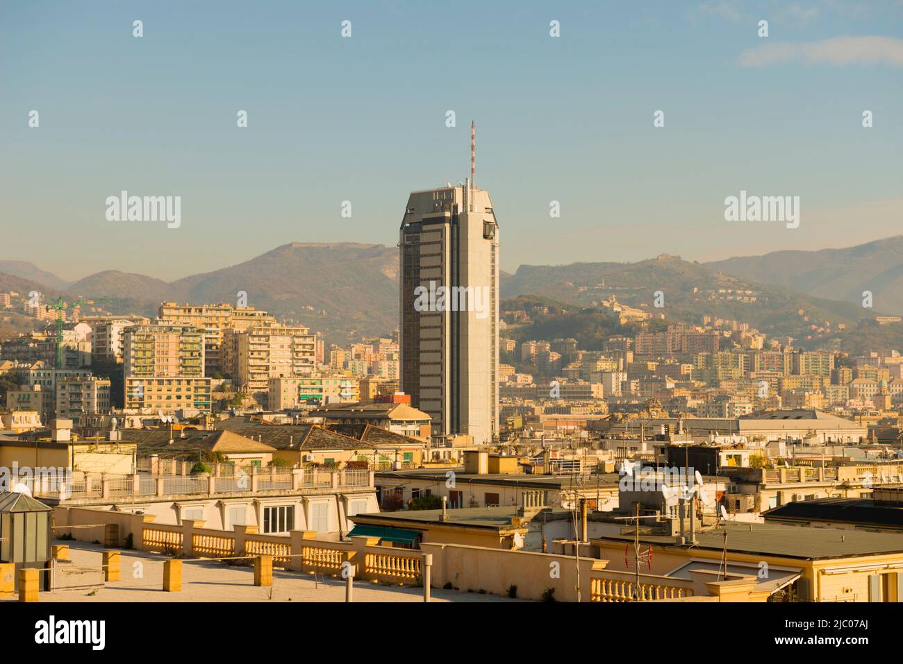 Cityscape and a Skyscraper with Sunlight over Genoa, Liguria in Italy ...