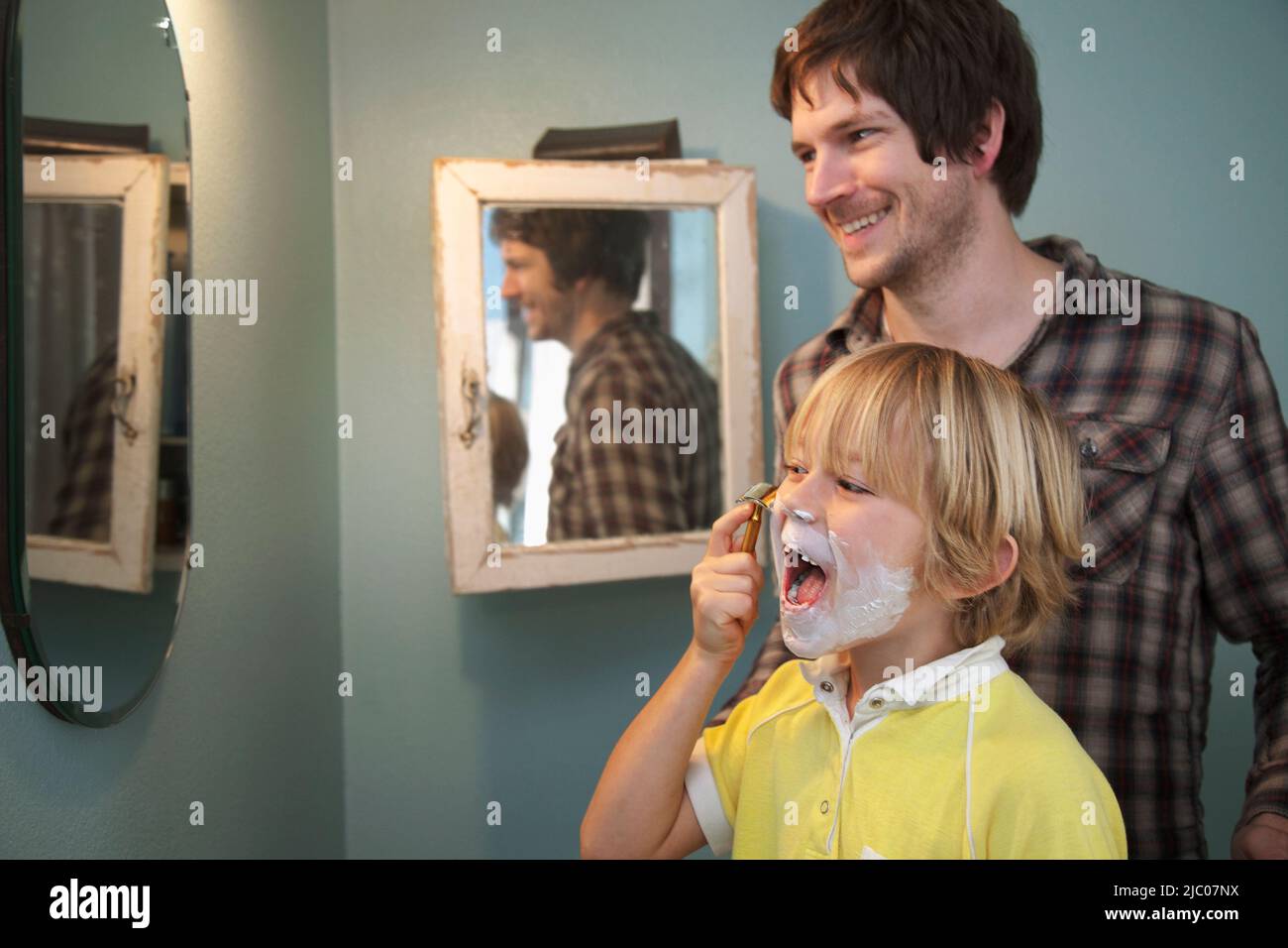 Man teaching to his son how to shave Stock Photo - Alamy