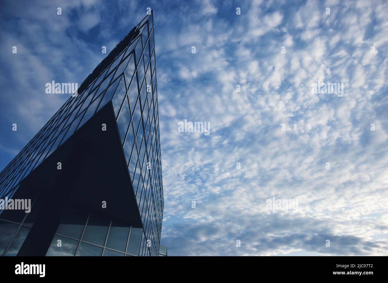 Architectural detail of a skyscraper against cloudy sky, Houston, Texas ...