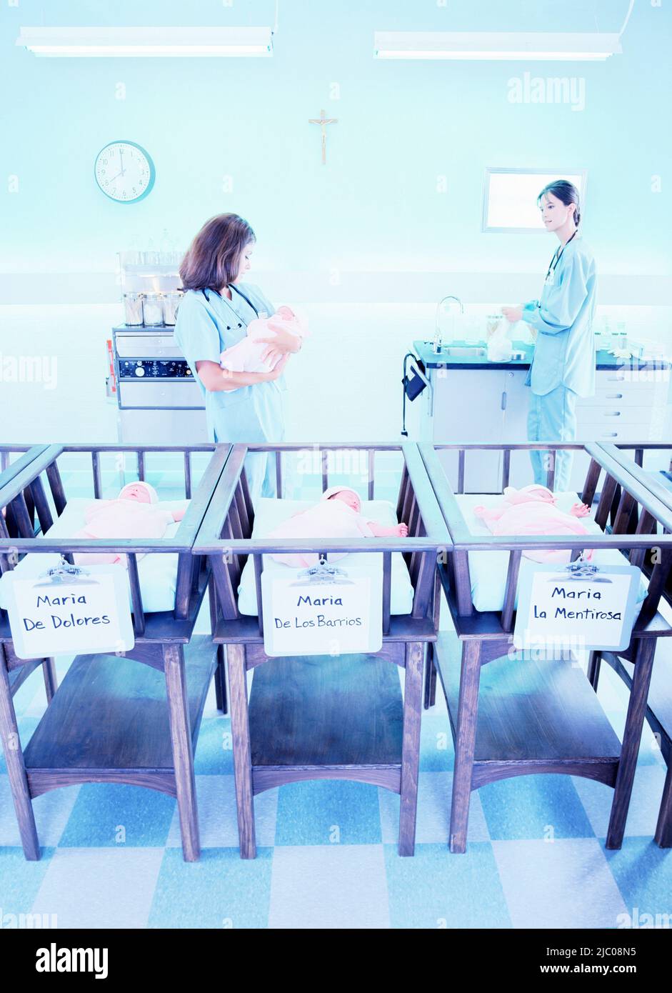 Nurses taking care of babies at the hospital maternity ward Stock Photo ... Nurses taking care of babies at the hospital maternity ward Stock Photo ...