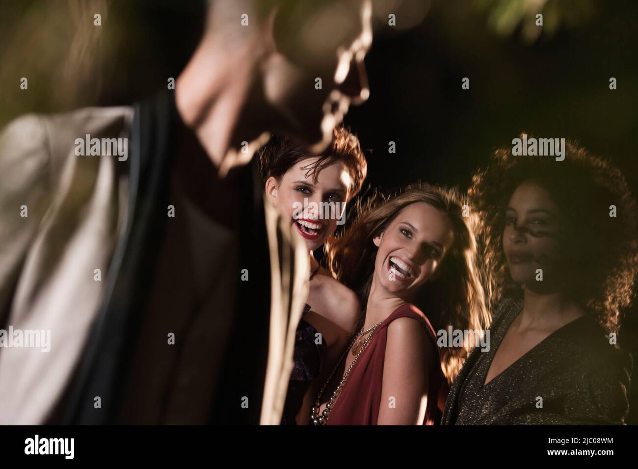 Friends having fun in a party, Manhattan, New York City, New York State ...