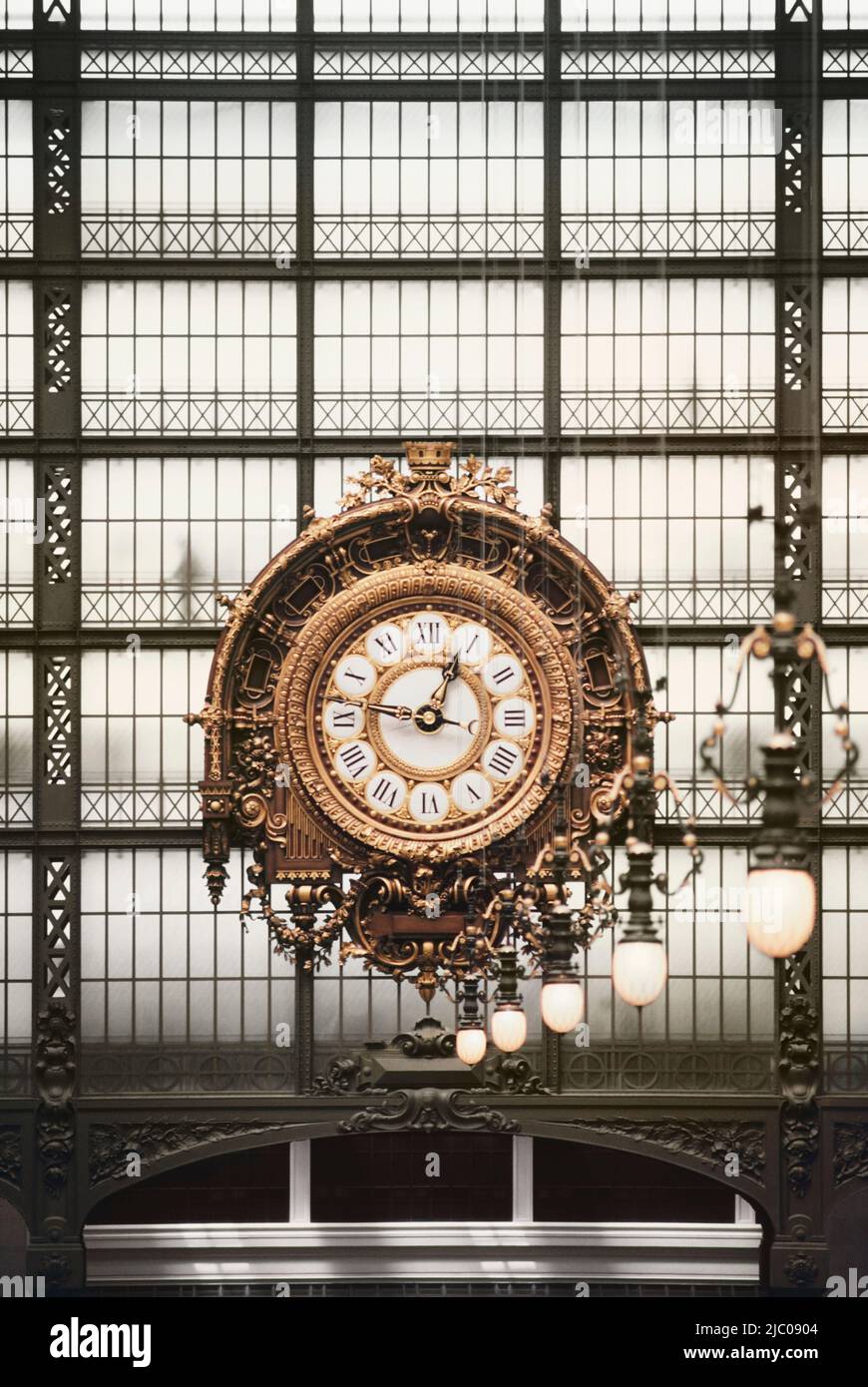 Clock in the main hall of Musee d'Orsay, a former railway station ...