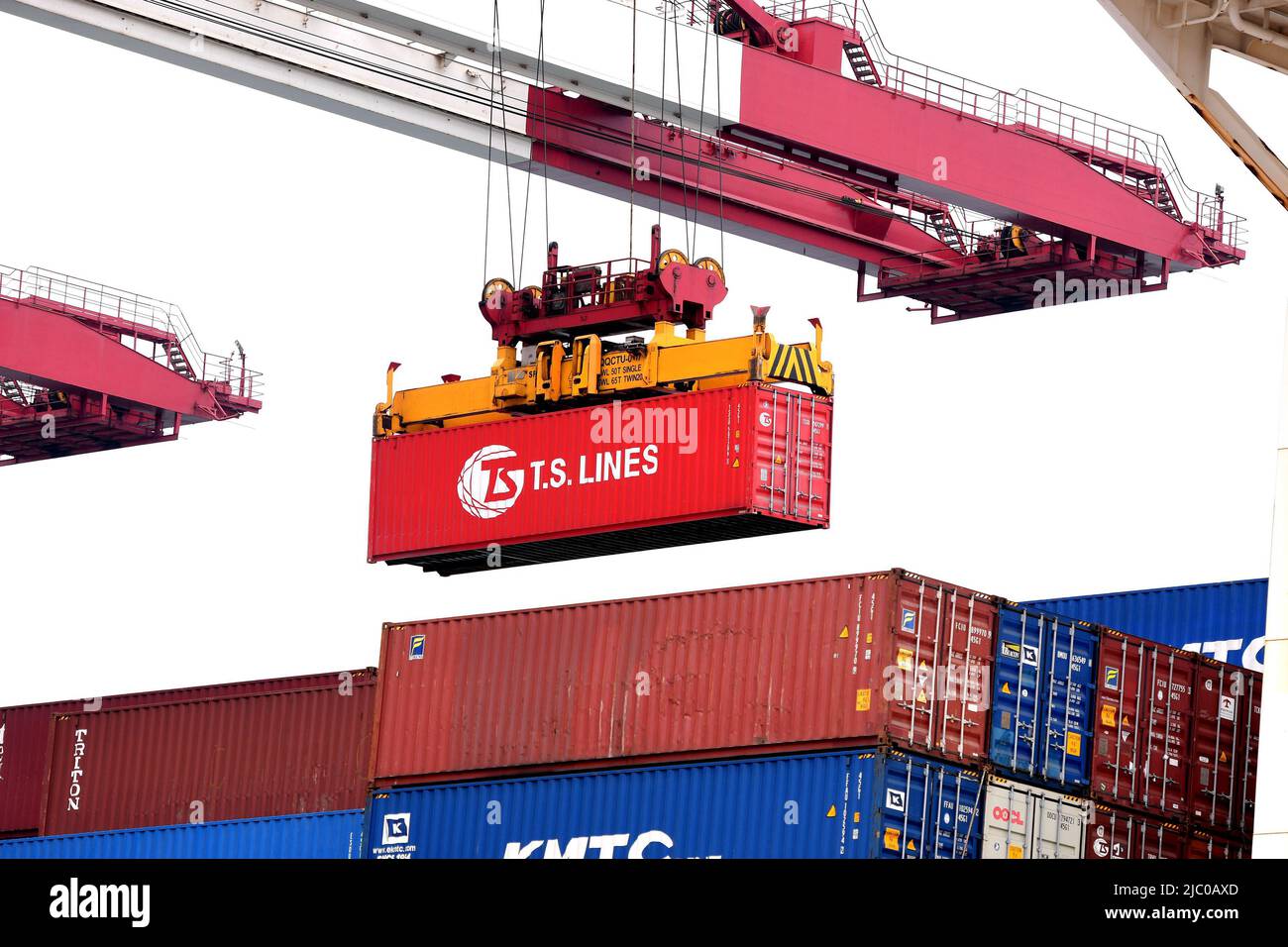 QINGDAO, CHINA - JUNE 9, 2022 - Cargo ships load and unload containers ...