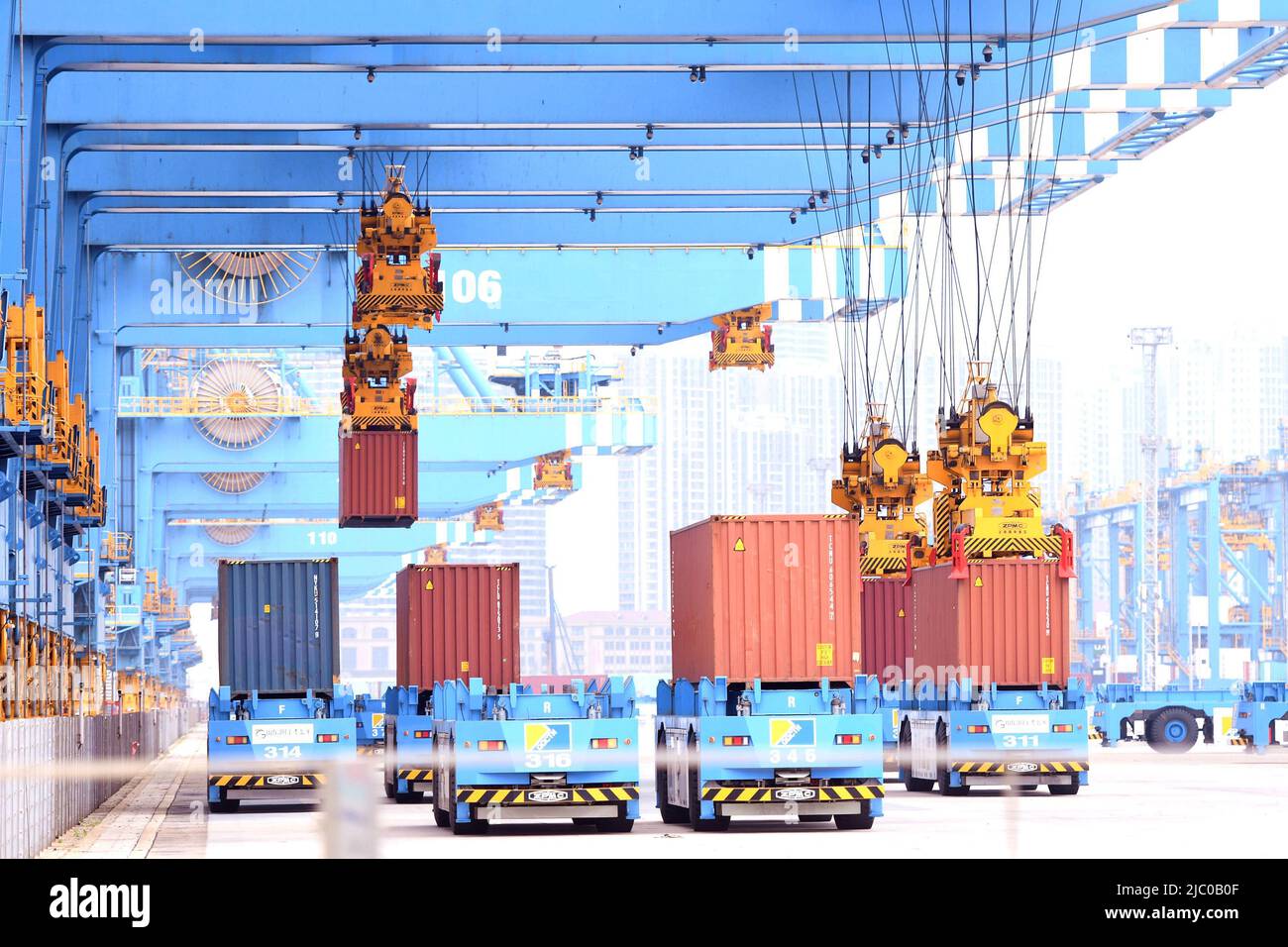 QINGDAO, CHINA - JUNE 9, 2022 - Freighters load foreign trade ...