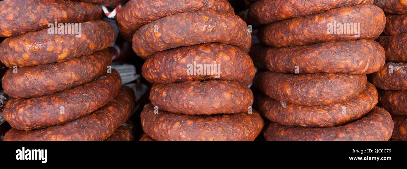 Red iberian chorizo displayed at street market stall. Closeup Stock ...