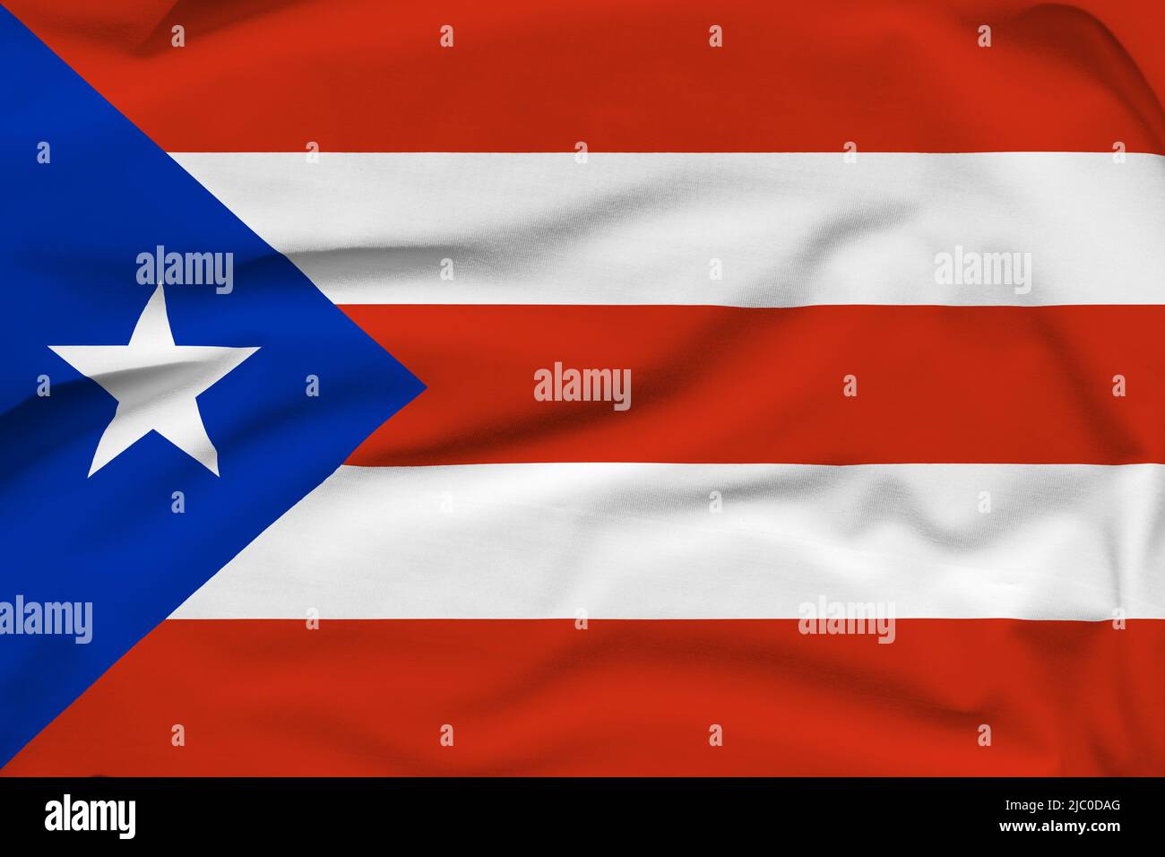 Puerto Rico national flag, folds and hard shadows on the canvas Stock ...