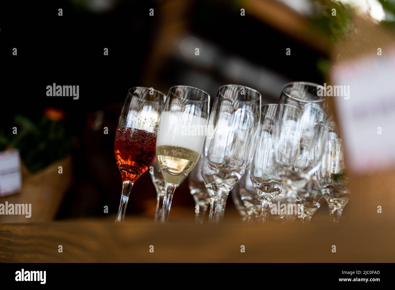 Luxury table settings for fine dining with and glassware, pouring wine ...