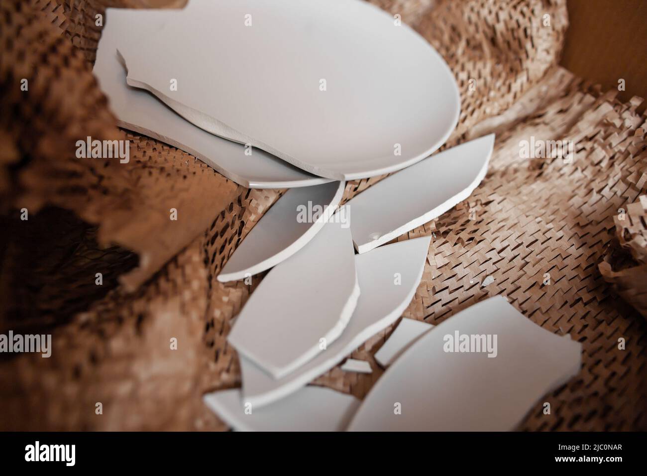 Broken plates and box hi-res stock photography and images - Alamy