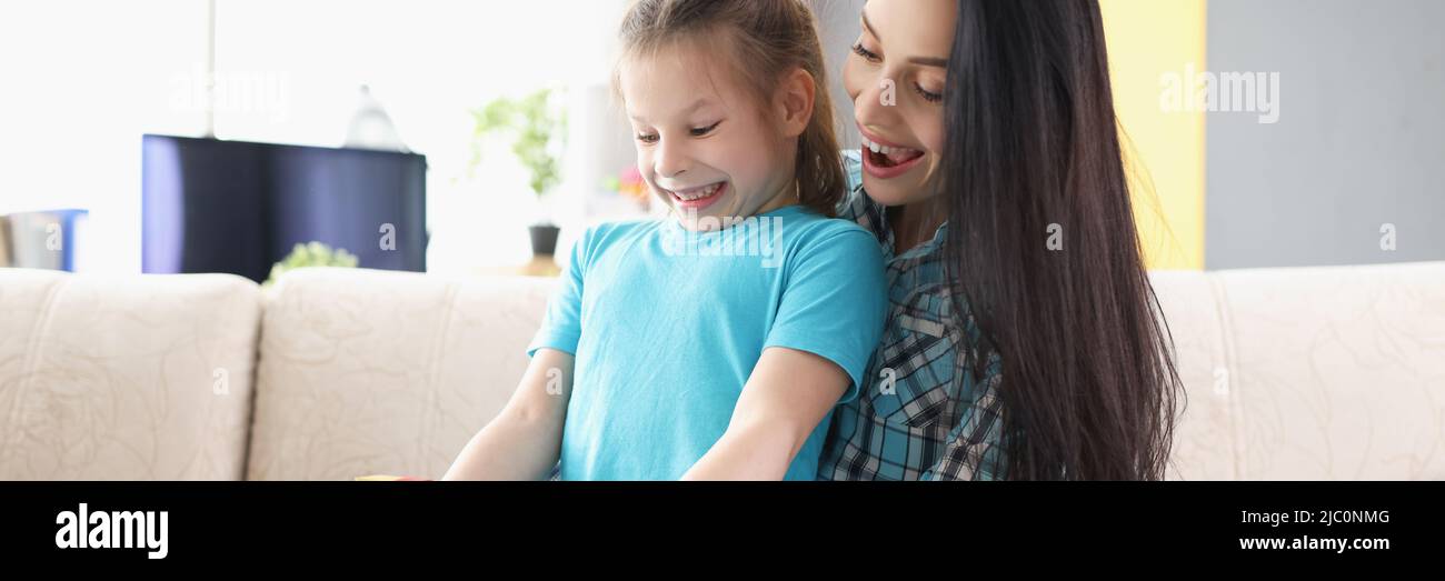 Cheerful child girl open present box and express happy emotions Stock ...