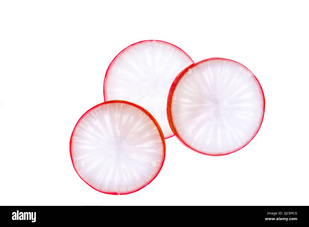 Radish slices isolated on white Stock Photo - Alamy