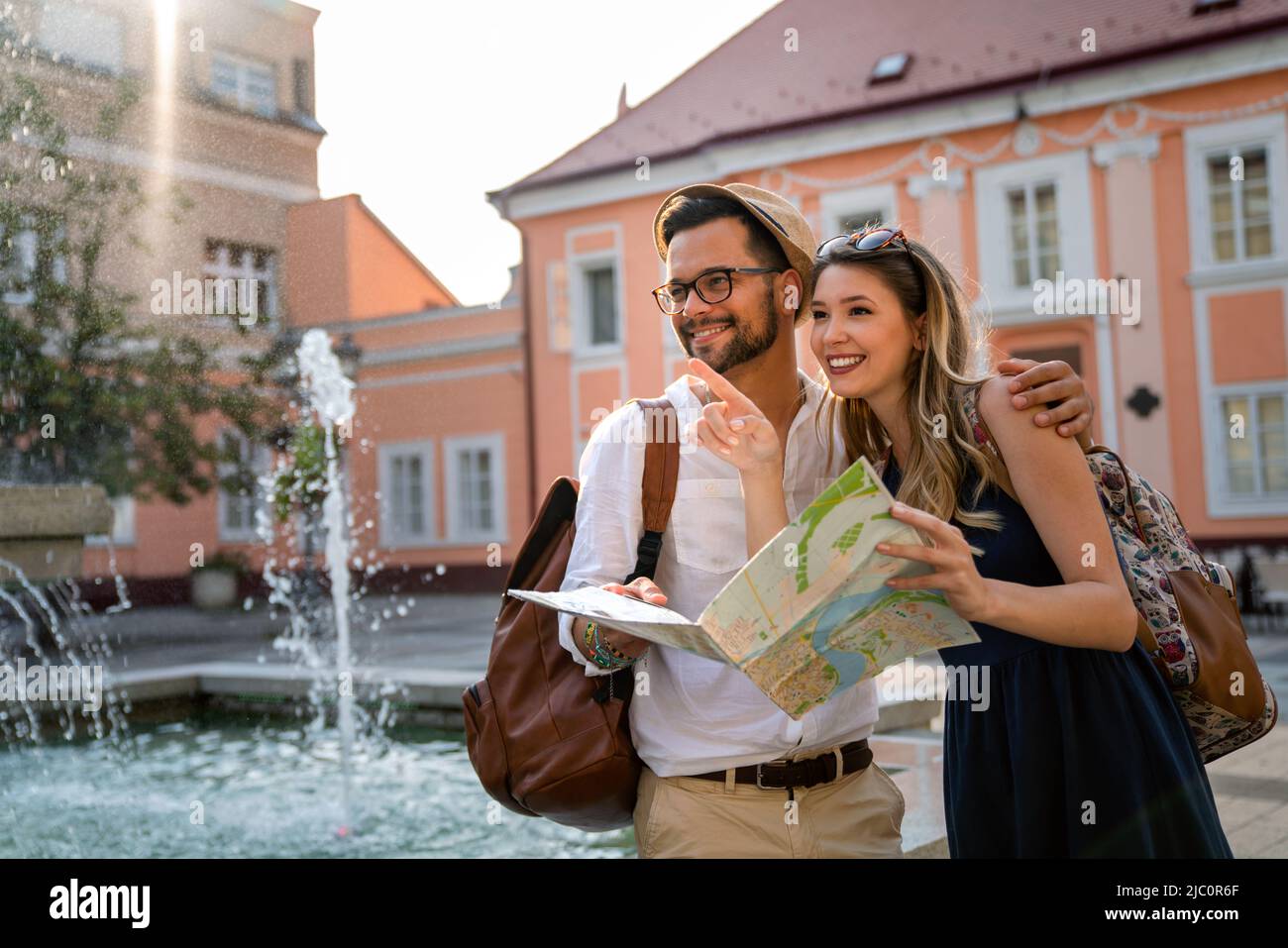 Happy tourist couple in love having fun, traveling smiling together on ...