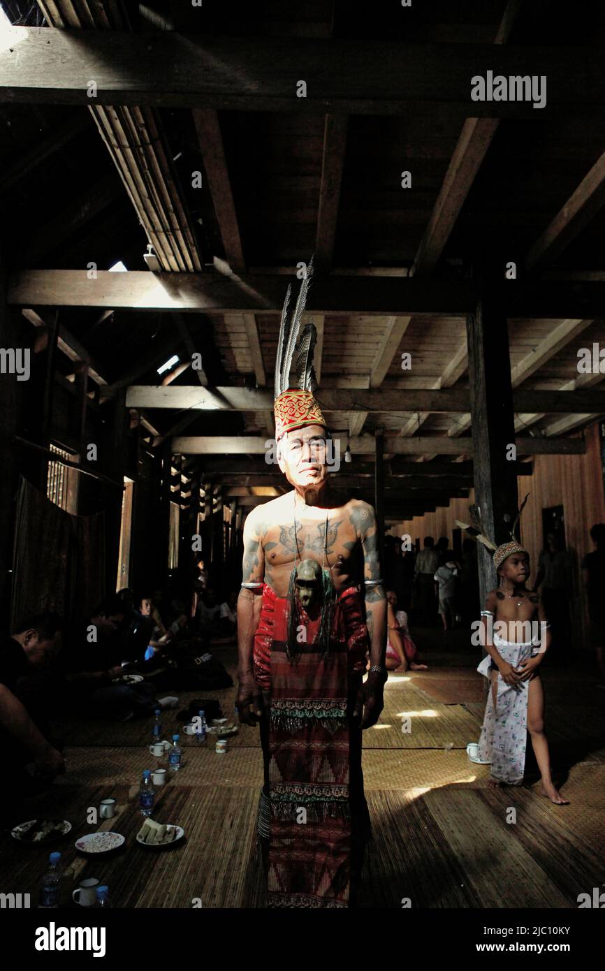 Portrait of Ramping, an elder, in traditional attire after the welcome ...