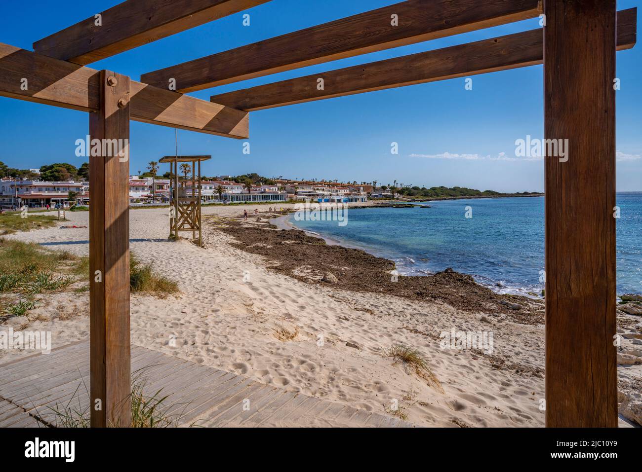 View of sea front and lifeguard tower at Playa Punta Prima, Punta Prima ...