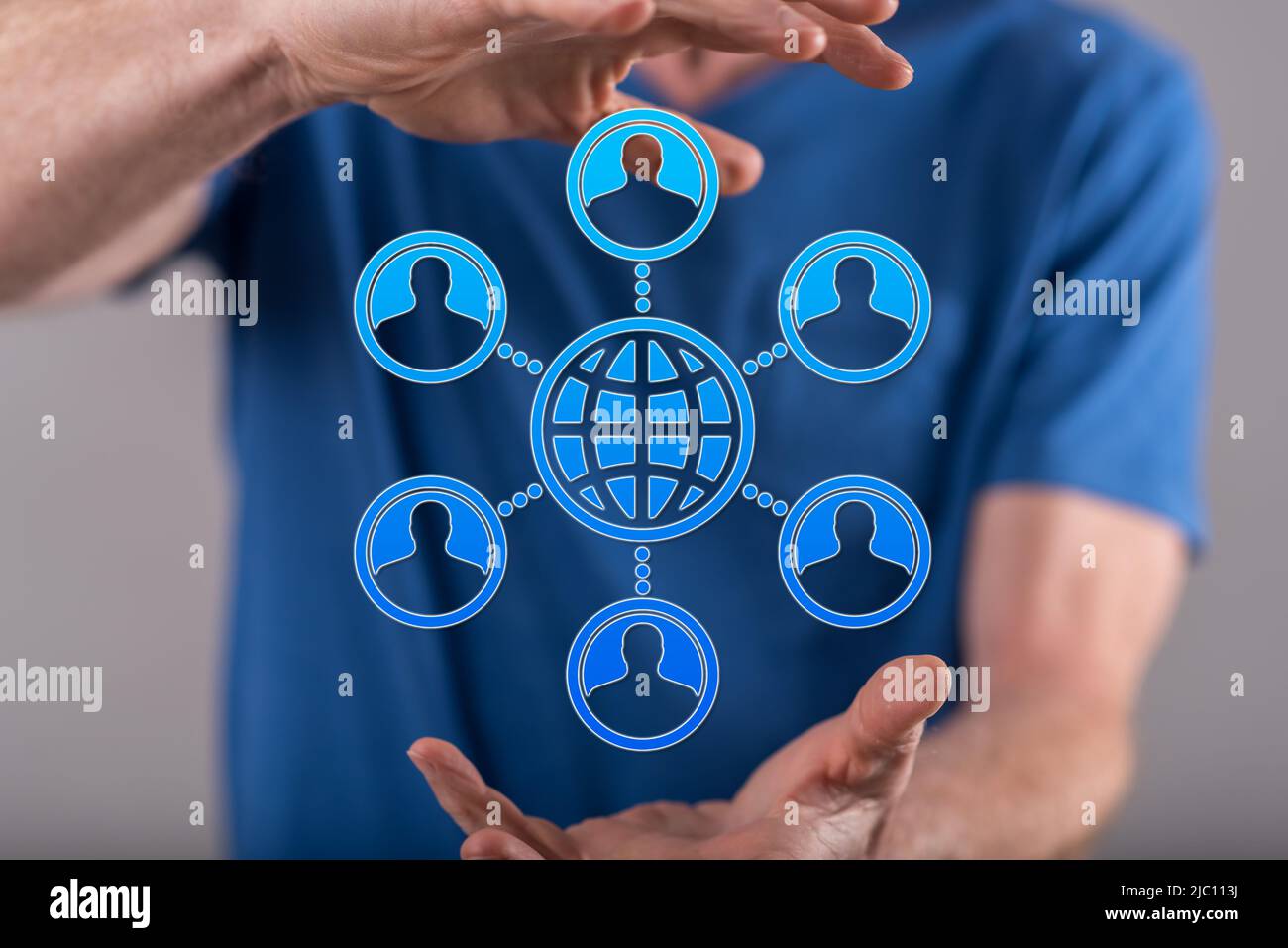 Globalization concept between hands of a man in background Stock Photo ...