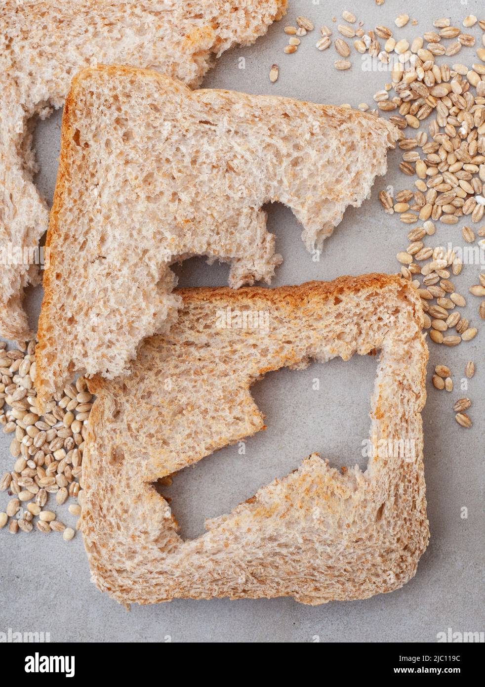 Brown bread with arrow cut out indicating rise in cost of bread and ...