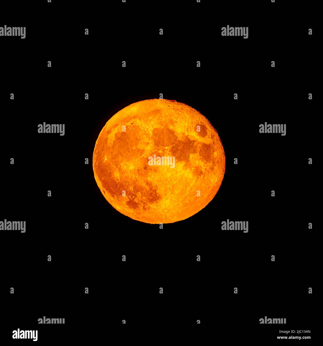 Bright orange and red fool moon over the sea. Red full moon in red ...