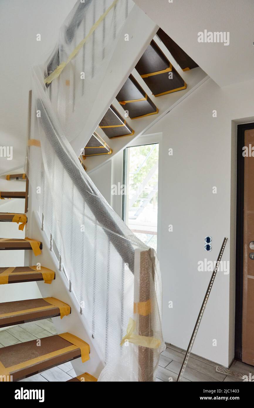 Install new stairs around the corner in the hallway when building a ...
