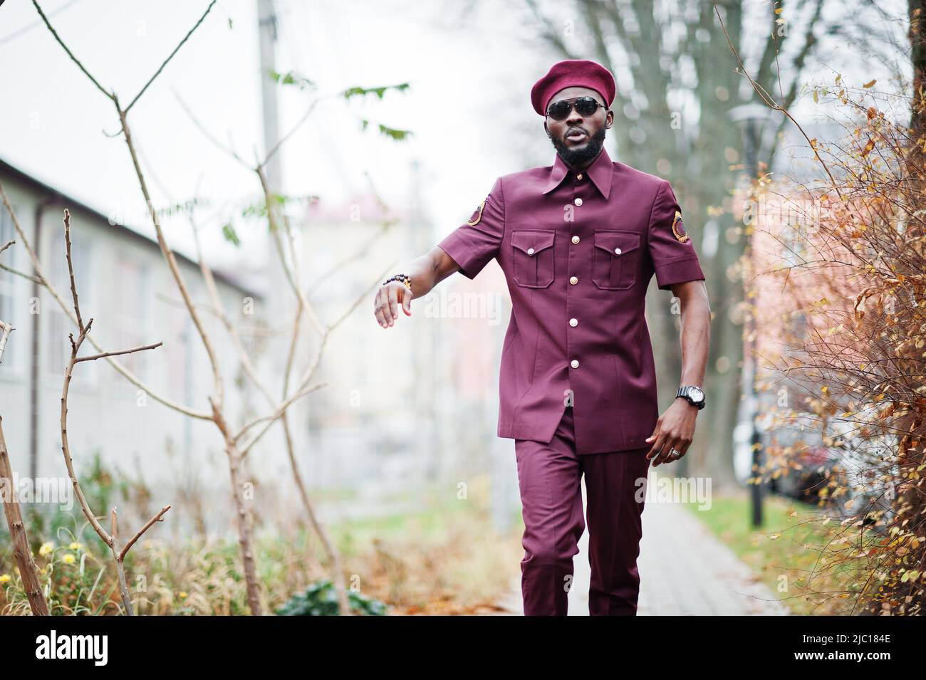 Portrait of African American military man in red uniform, sunglasses ...