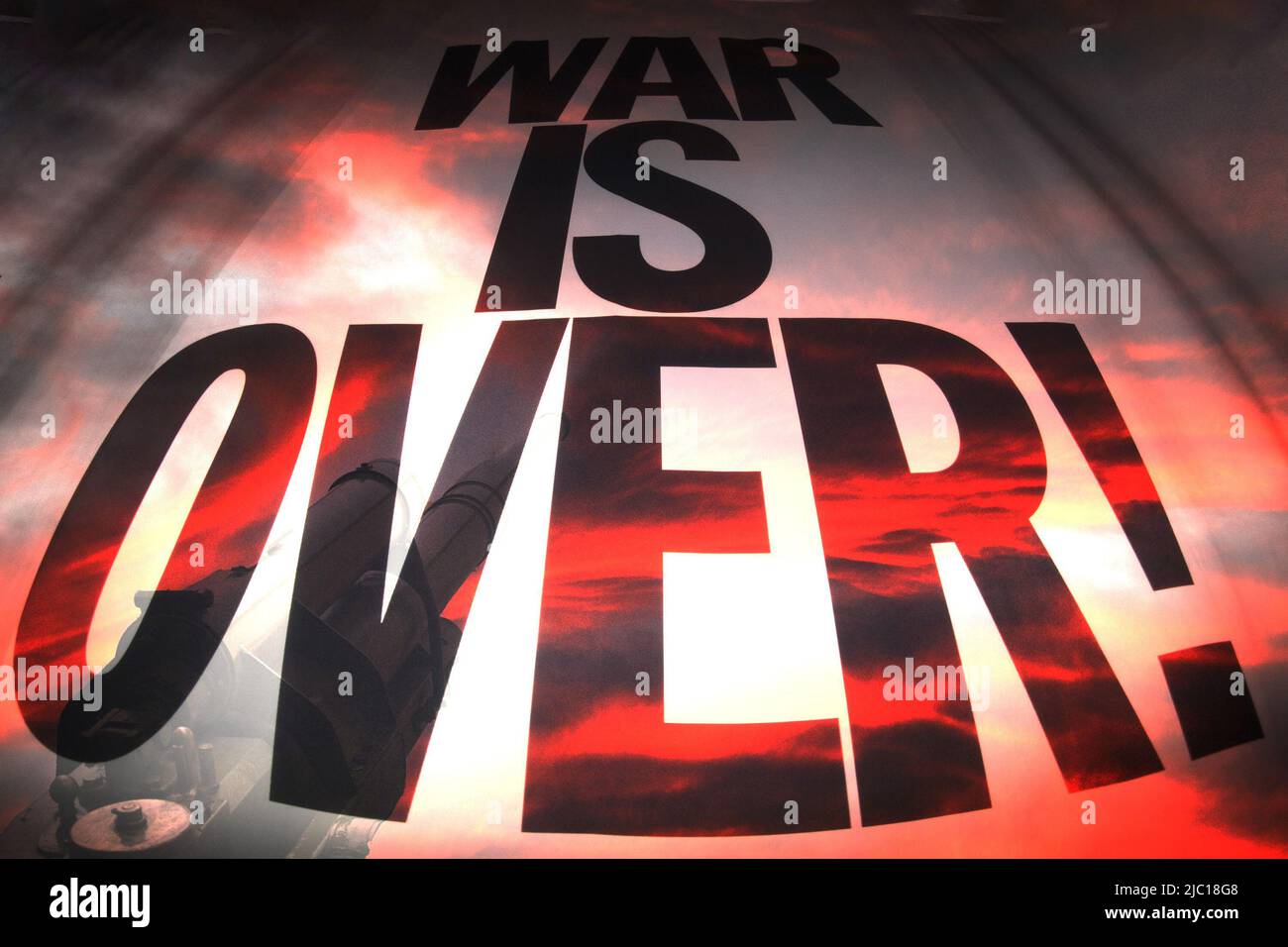 War is over writing black on cannon with fire background Stock Photo ...