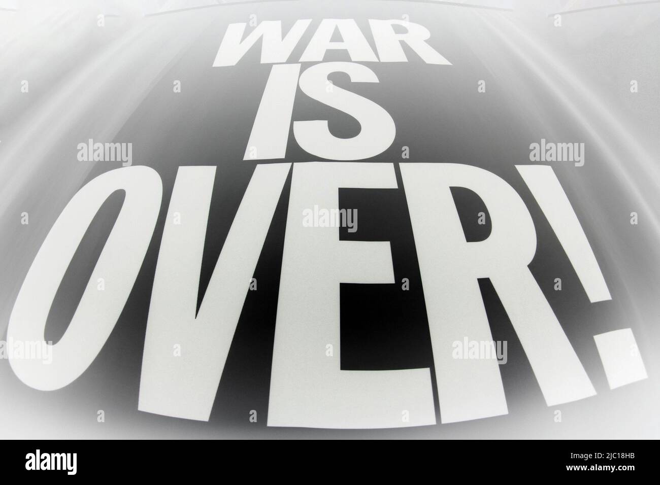 War is over writing white on black background Stock Photo - Alamy