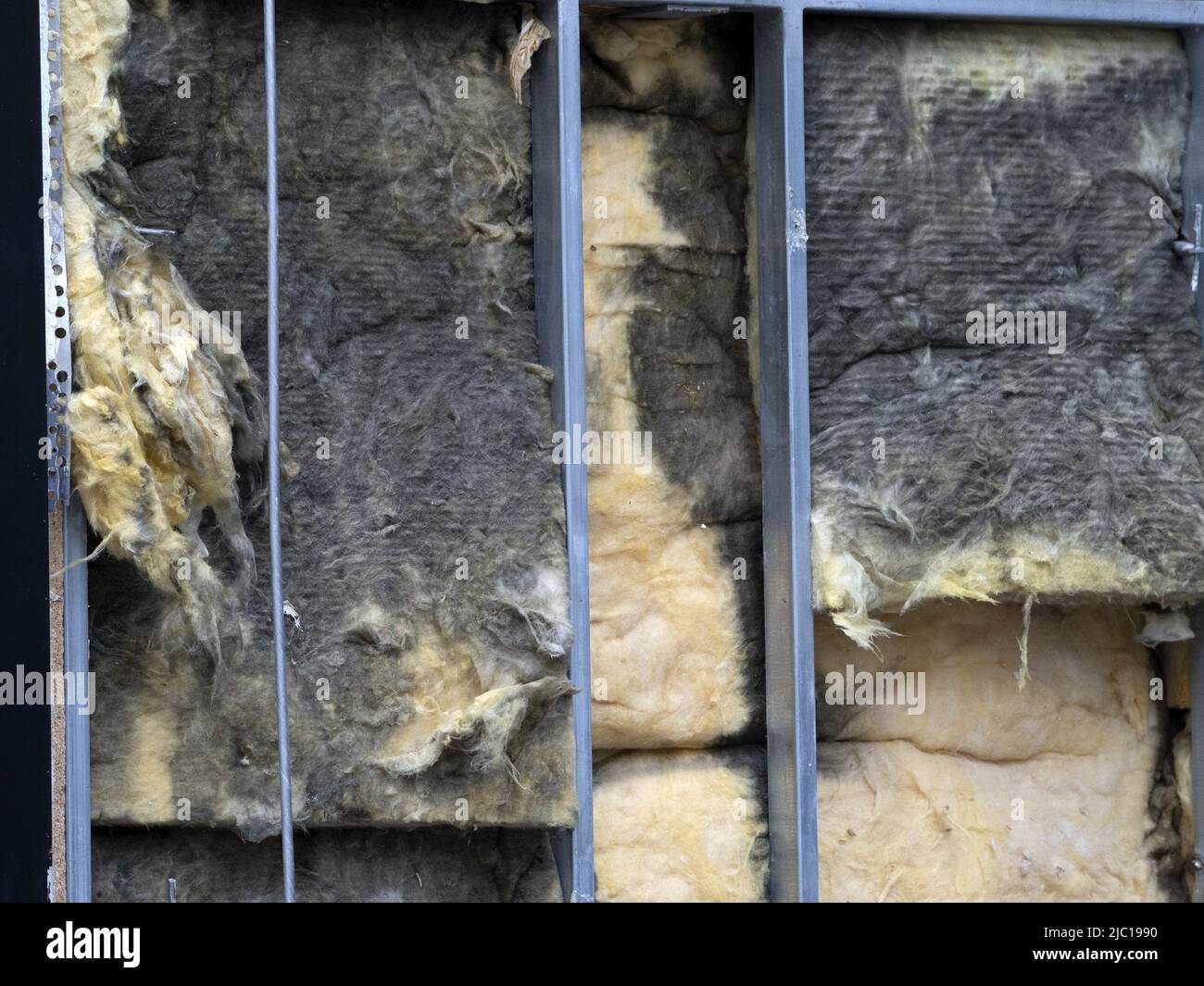 isolating wool house between walls detail Stock Photo - Alamy