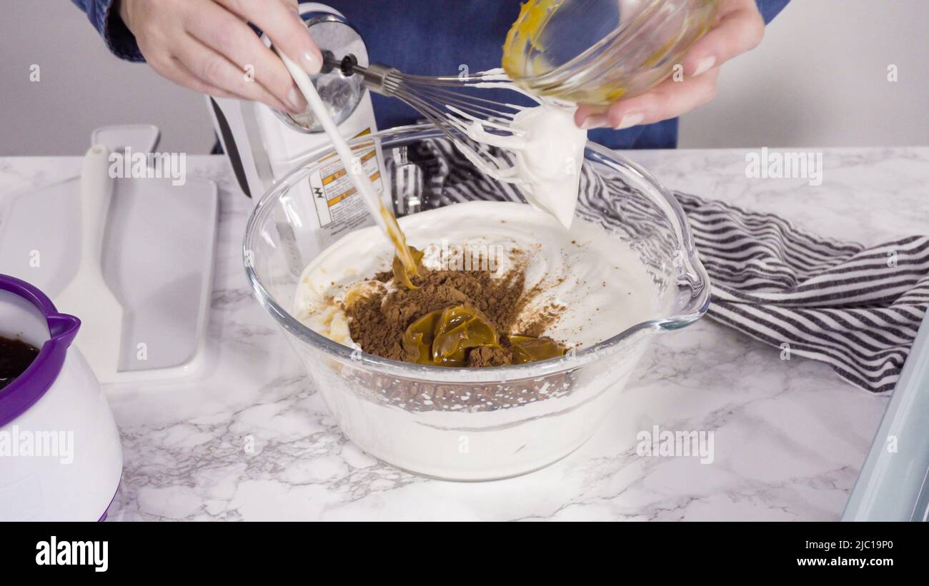 Step by step. Preparing homemade chocolate ice cream in a hand kitchen ...