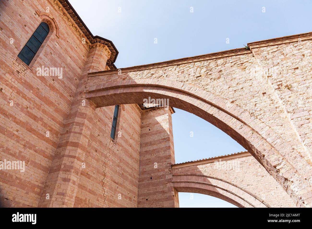 flying buttress of the Basilica of Santa Chiara in Assisi, Umbria ...