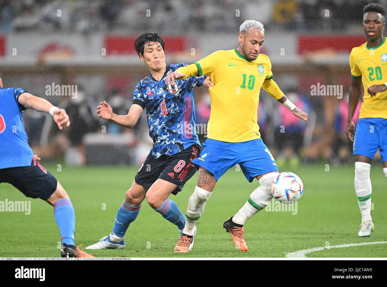 Neymar (10) of Brazil and Genki Haraguchi (8) of Japan during the Kirin ...