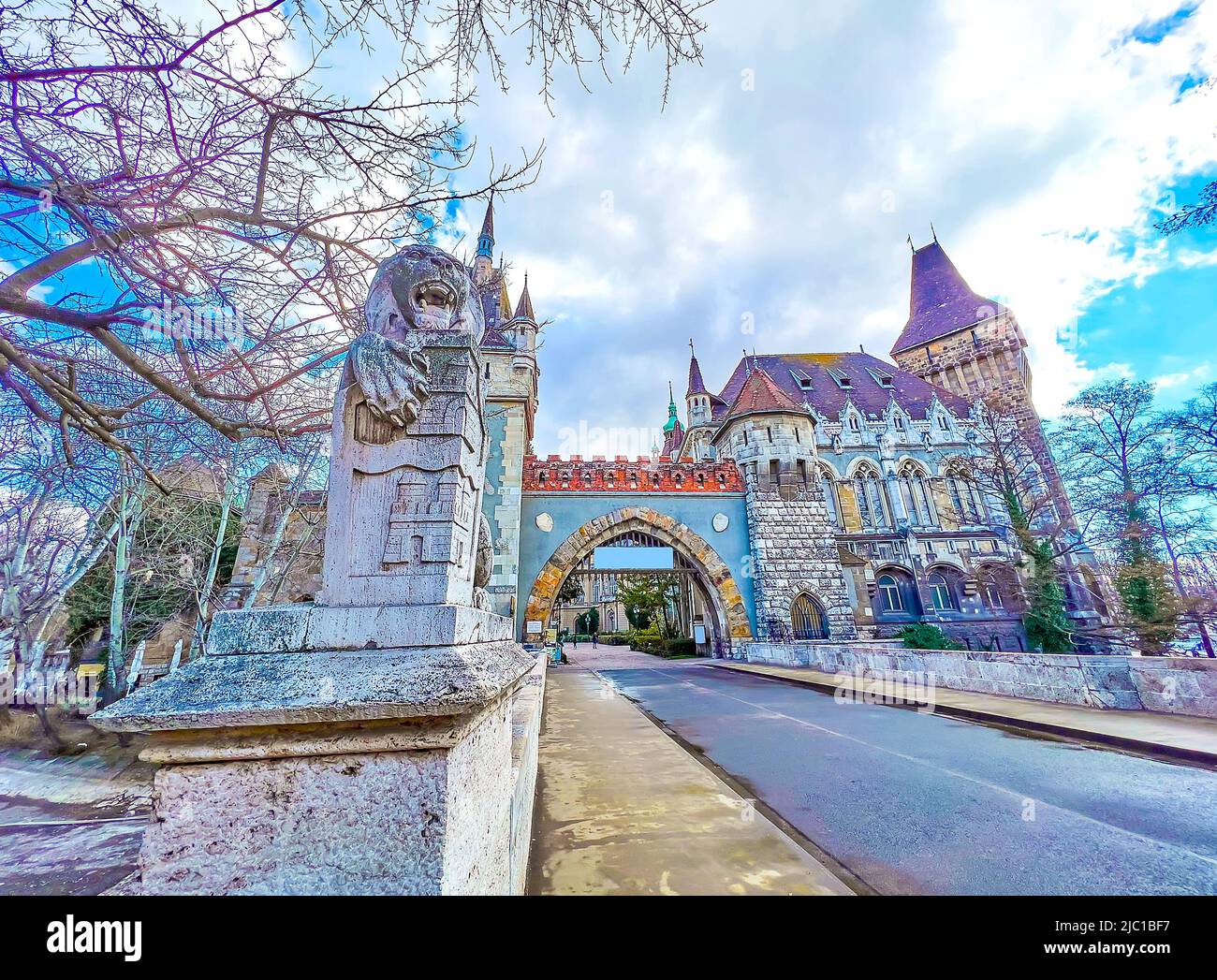 The main entrance to outstanding Vajdahunyad Castle leads along over ...